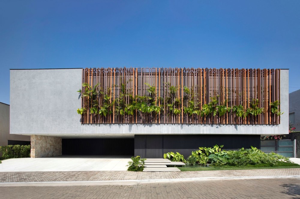 Volumetria, madeira e pedras naturais marcam projeto de casa no Piauí ...